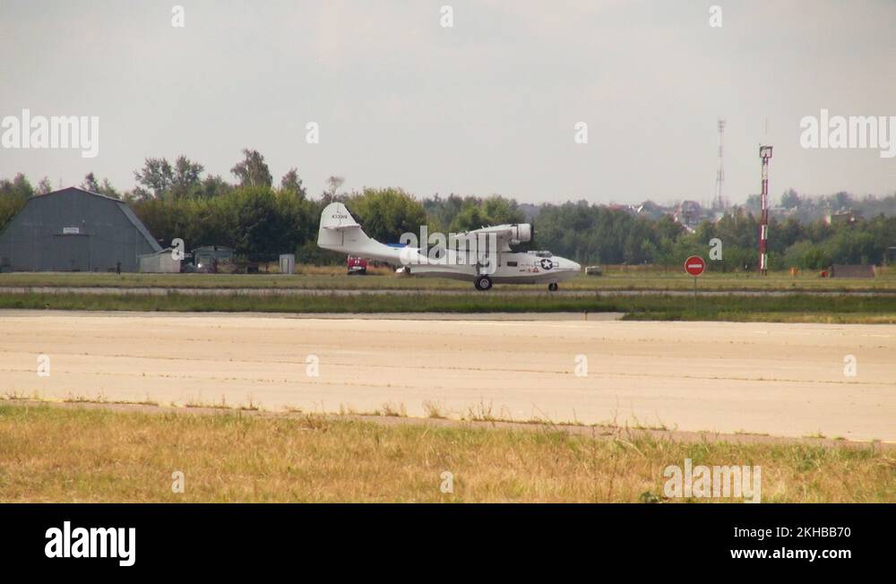 Flying boat PBY-5A Catalina American naval patrol bomber steers runway ...