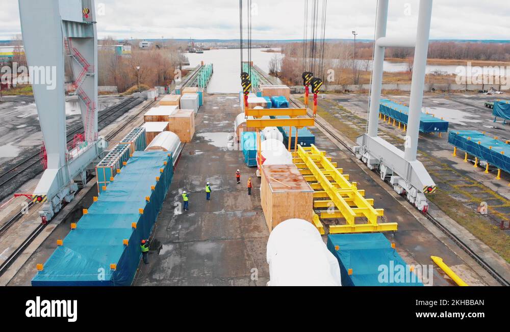 Cargo port - A big industrial crane loading the cargo on the freight ...