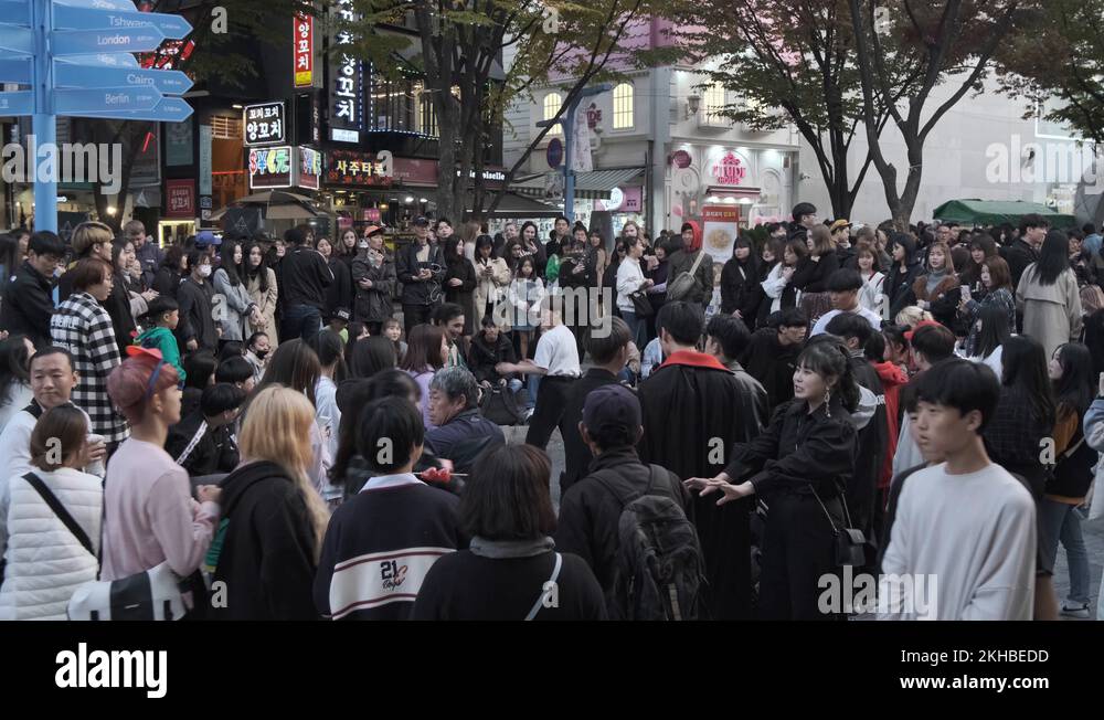 South Korea, Hongdae - crowd watching Korean dancers busking in Hongdae ...