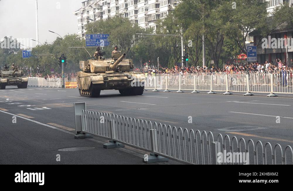 Army tanks of Chinese defense forces (People's Liberation Army) ride in ...