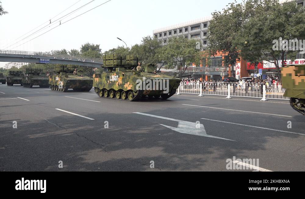 Chinese soldiers drive tanks equipped with anti tank missile system ...