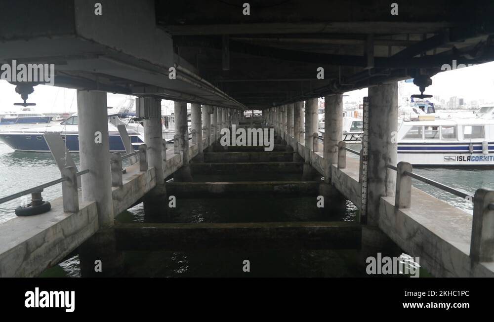 Structure underneath pedestrian concrete dock. Harbour infraestructure ...