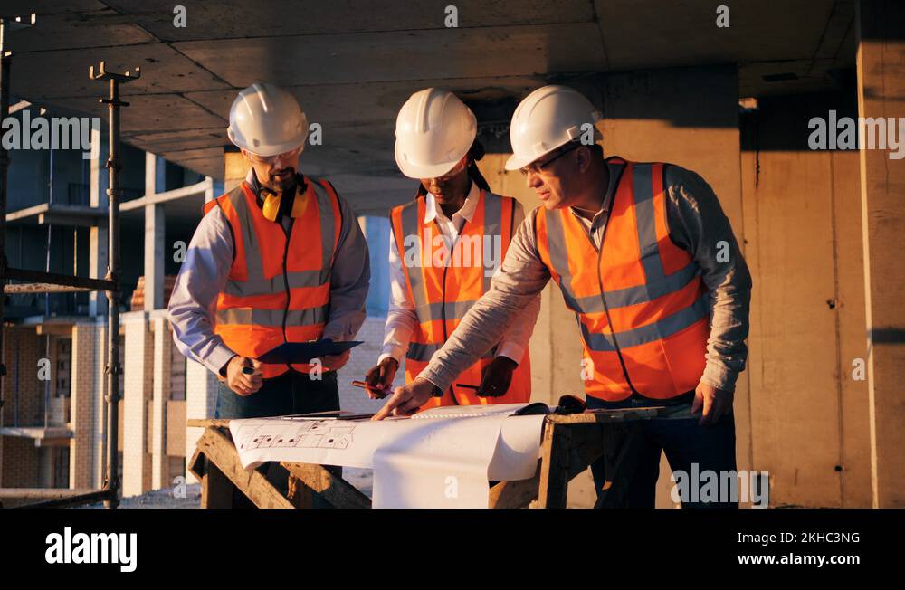 Group of architects are planning a construction project Stock Video ...