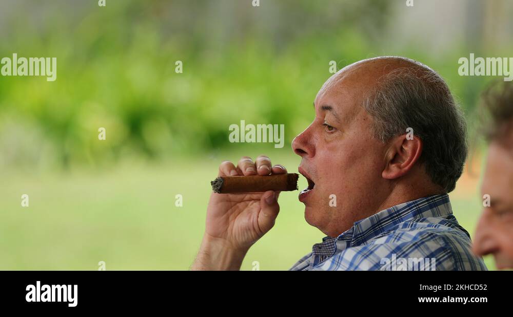 Elderly black men smoking cigar Stock Videos & Footage - HD and 4K Video Clips - Alamy