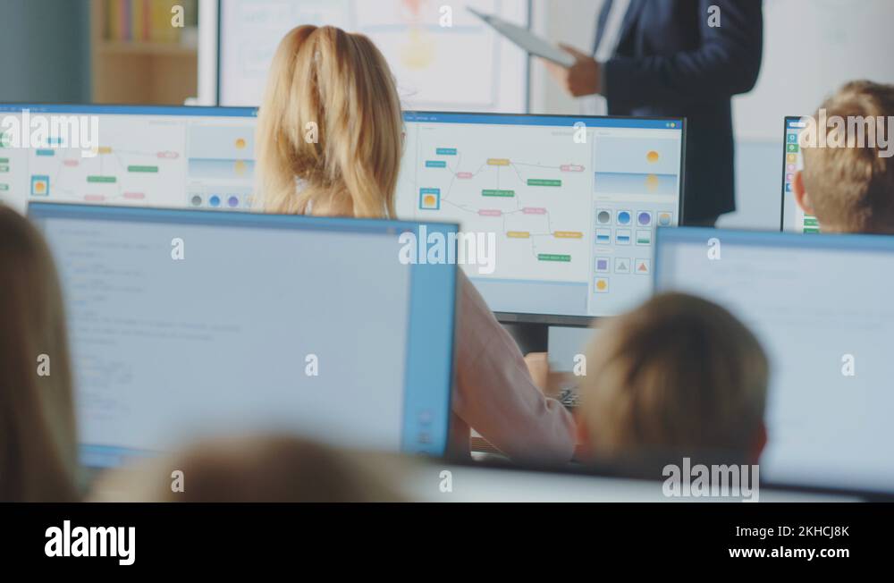 Elementary School Class: Teacher Uses Digital Whiteboard, Explain ...