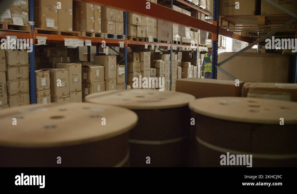 Man Scanning Box Using Barcode Reader At Warehouse Stock Video Footage