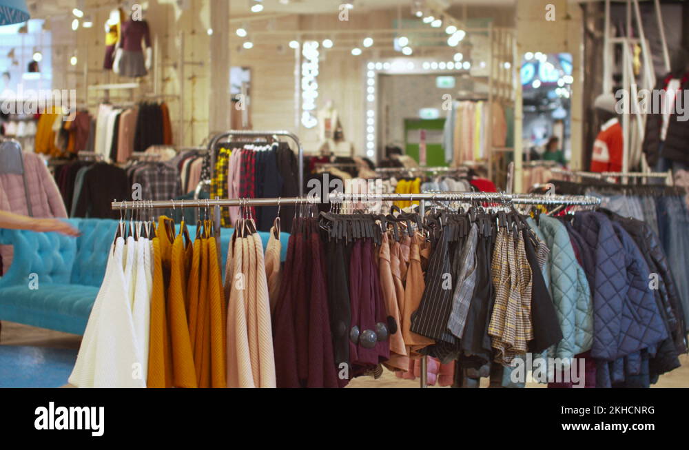 Two Girls Take Off Their Clothes From The Hanger Stock Video Footage