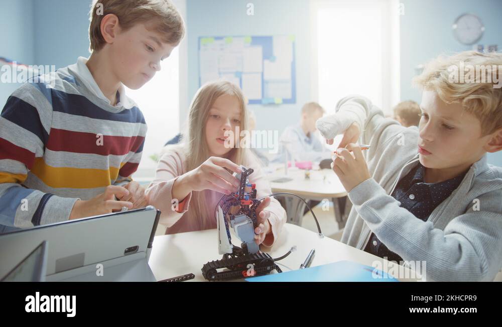 Elementary School Robotics Classroom: Diverse Group of Children ...