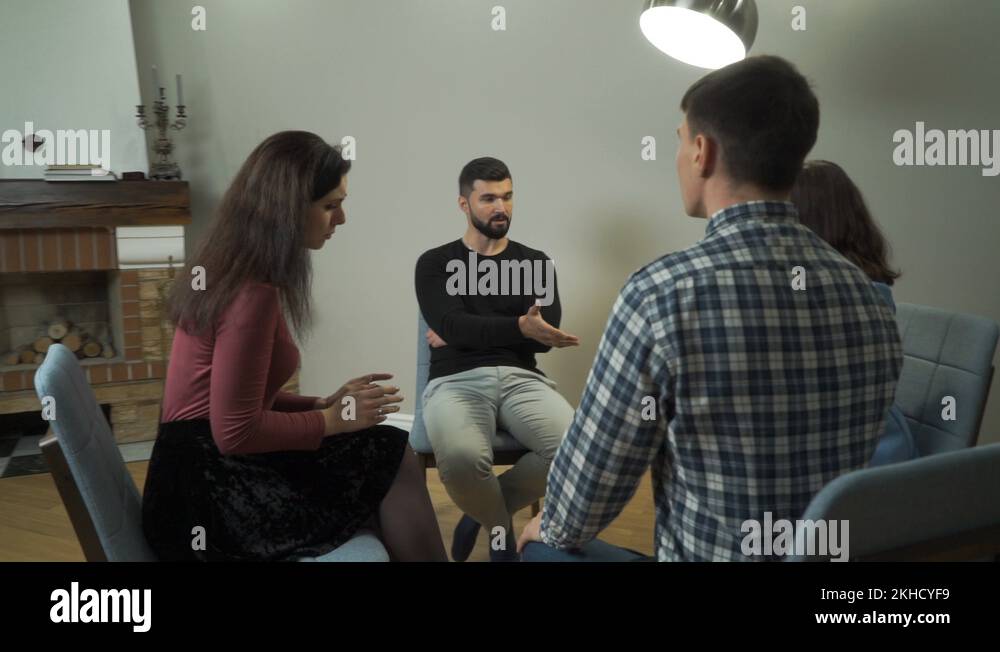 Four people sitting on chairs Stock Videos & Footage - HD and 4K Video ...