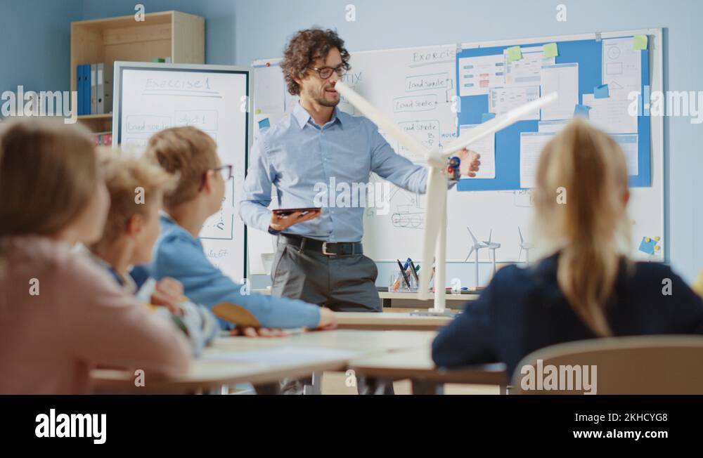 School Teacher Show to Classroom how Renewable Energy and Wind Turbines ...