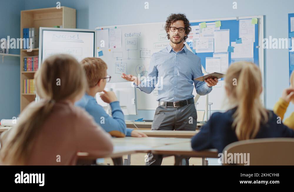 School Teacher Show to Classroom how Renewable Energy and Wind Turbines ...