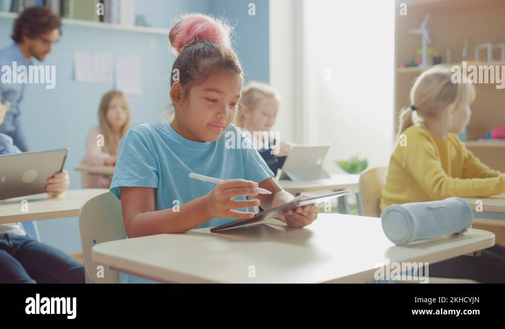 Girl at school computer Stock Videos & Footage - HD and 4K Video Clips ...