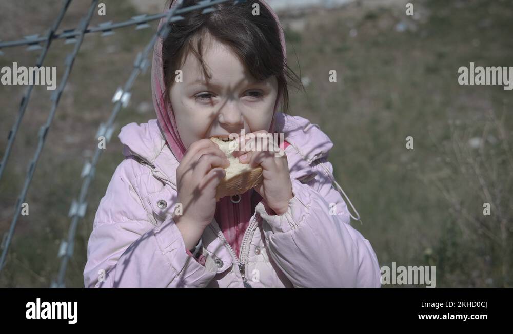 Poor child bread Stock Videos & Footage - HD and 4K Video Clips - Alamy