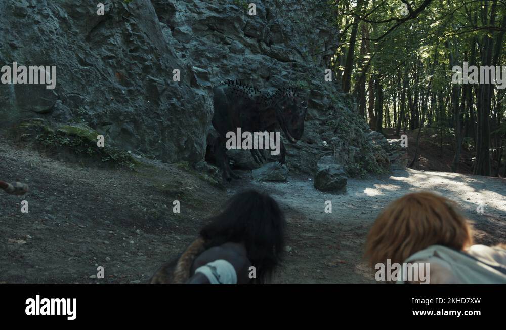 Prehistoric Tribe of Neanderthals Attacking Hunting Dangerous Dinosaur ...