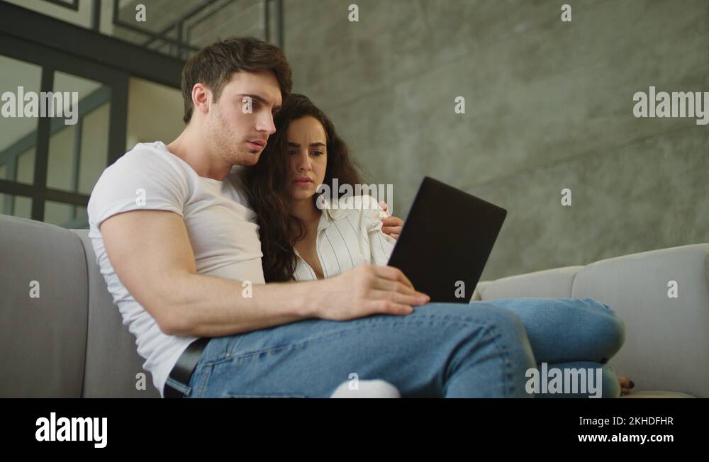 Scared couple sofa Stock Videos & Footage - HD and 4K Video Clips - Alamy