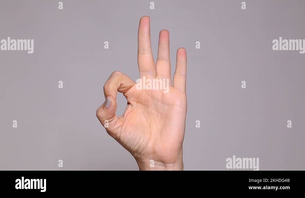 Ok symbol, thumb up, victory v sign, rock and roll, crossed fingers ...