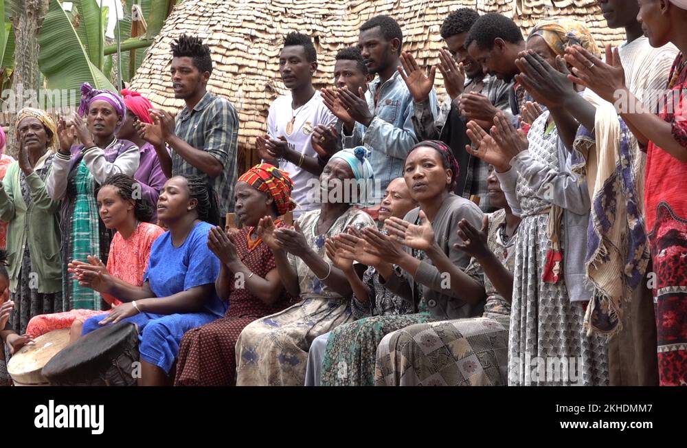People clapping and singing traditional songs, tribal ceremony in ...