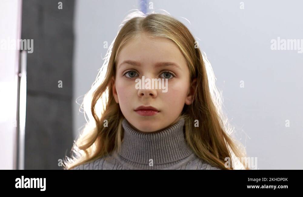 little girl talking on camera close-up, the child talks about himself ...