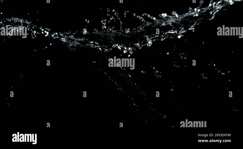 Water Exploding and Splashing against Black Background, Slow motion 4K ...