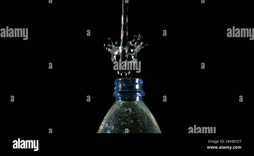Water Exploding and Splashing on Bottle against Black Background, Slow ...