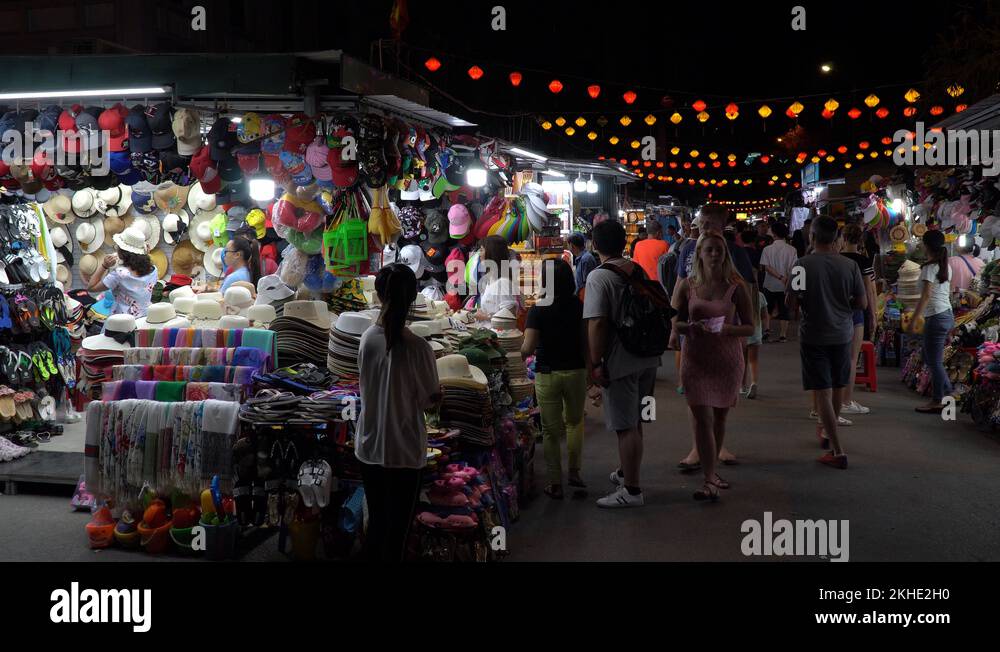 A crowd of people in the night market of clothing and souvenirs Stock ...
