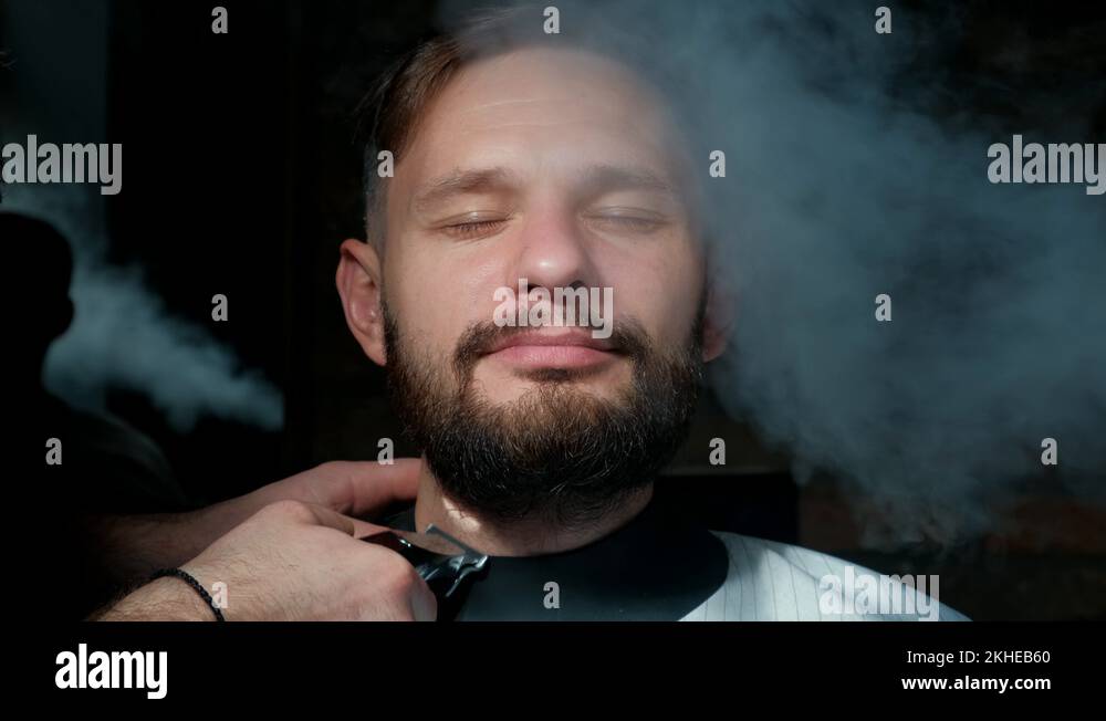 Shaving process of beards in Barbershop. Steam shave Stock Video ...