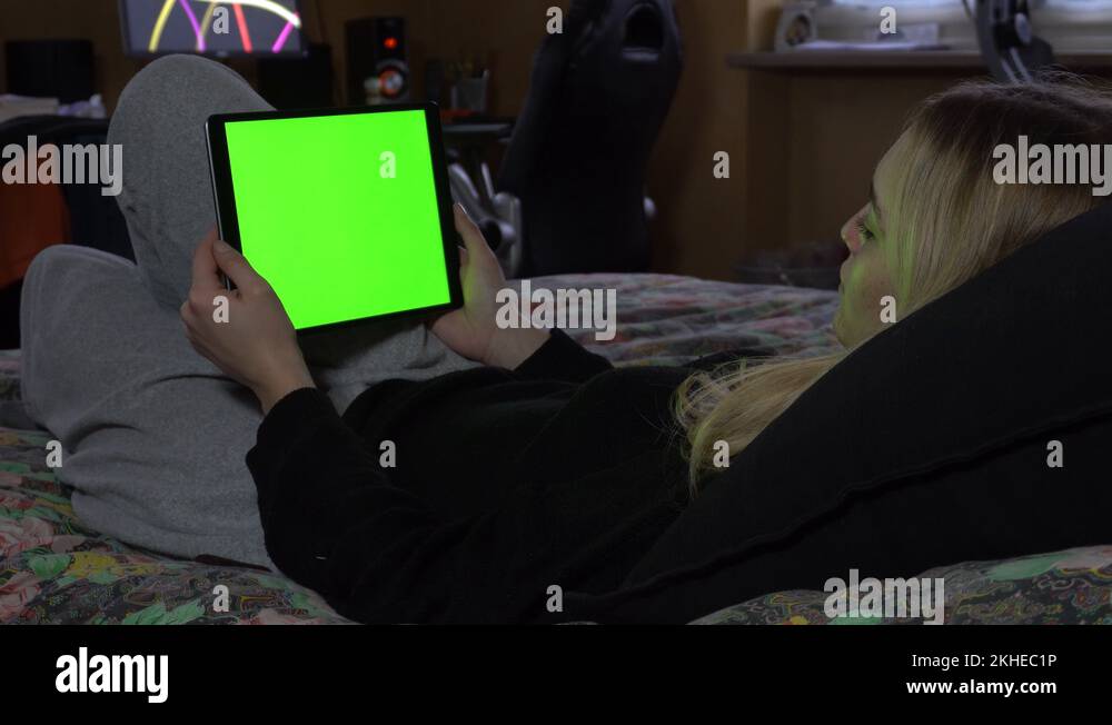Woman Lying on Couch at Home Watching Tablet Green Screen Stock Video ...