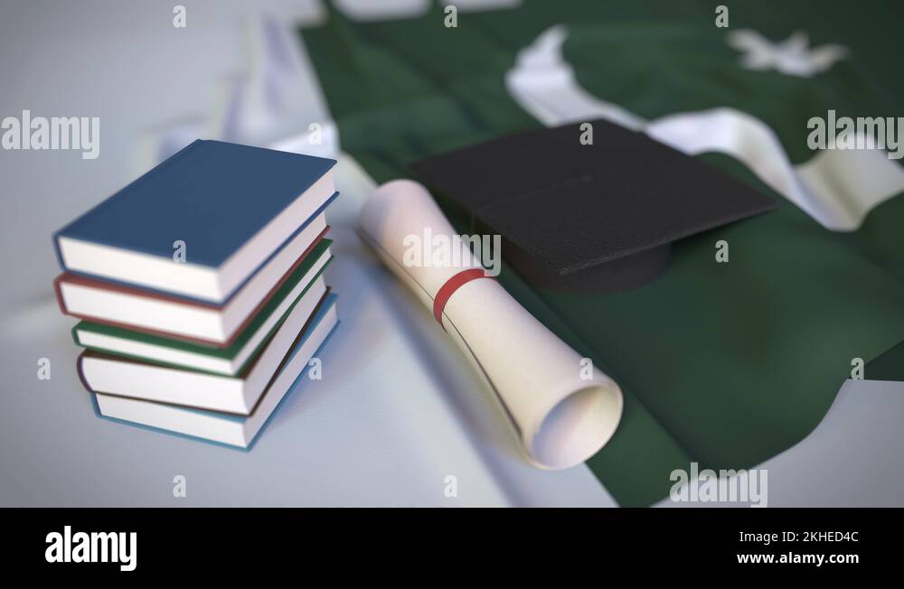 Graduation cap, books and diploma on the Pakistani flag. Higher ...