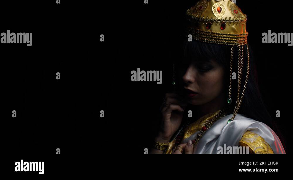 Close up of Saraswati the goddess of knowledge, wearing golden crown ...