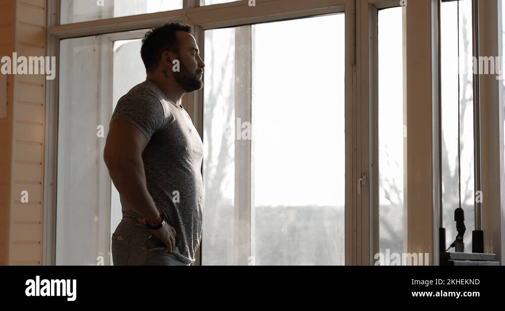 Man exercising in a gym making his latissimus dorsi muscles more ...