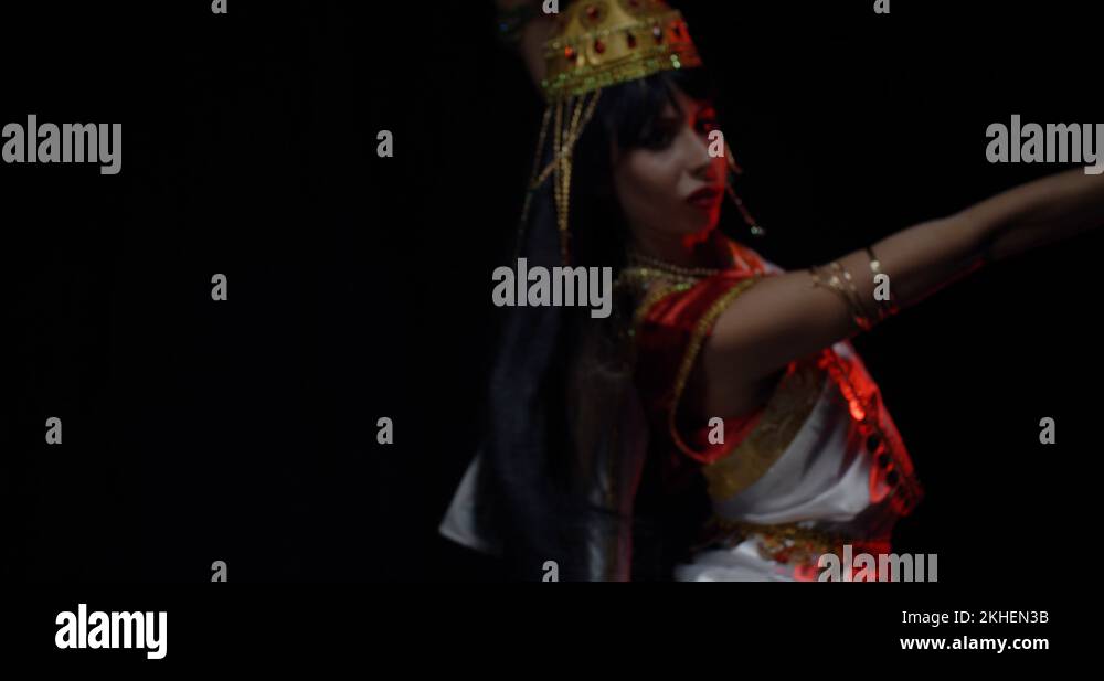 Dancing goddess Saraswati in white dress with jewelry, black background, 4k Stock Video Footage ...