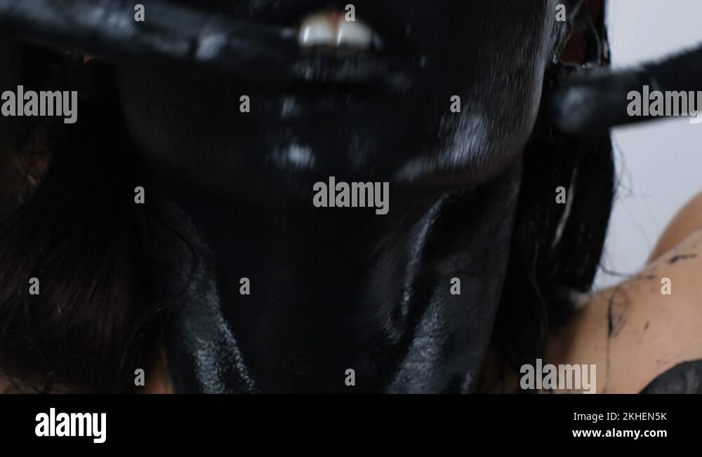 Mad eyes psycho woman crazy mask close up looking at camera white ...