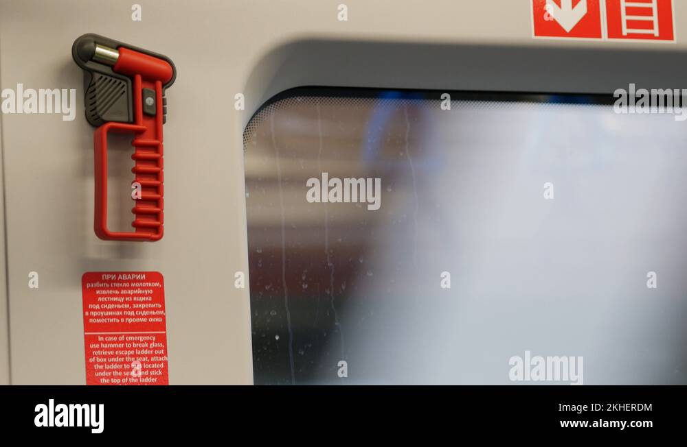 Emergency exit window in the wagons of the Moscow Central Ring MCC. Red ...