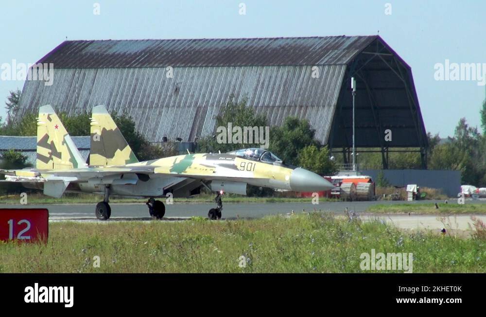 Multi-purpose super-maneuverable fighter Sukhoi Su-35 is turn on runway ...