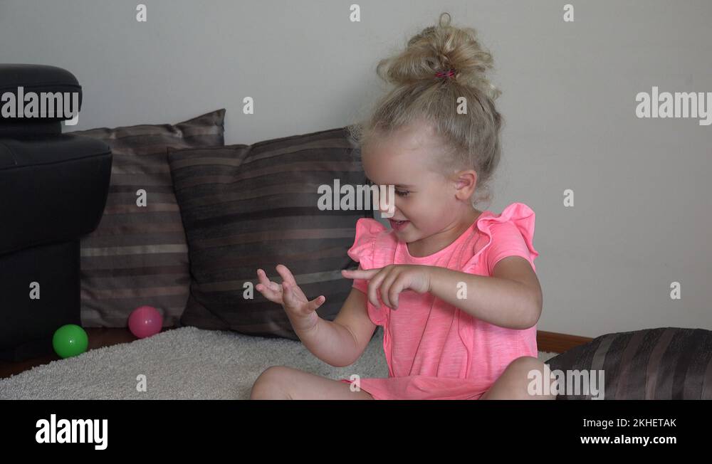 Little young model girl count her fingers in front of camera Stock ...