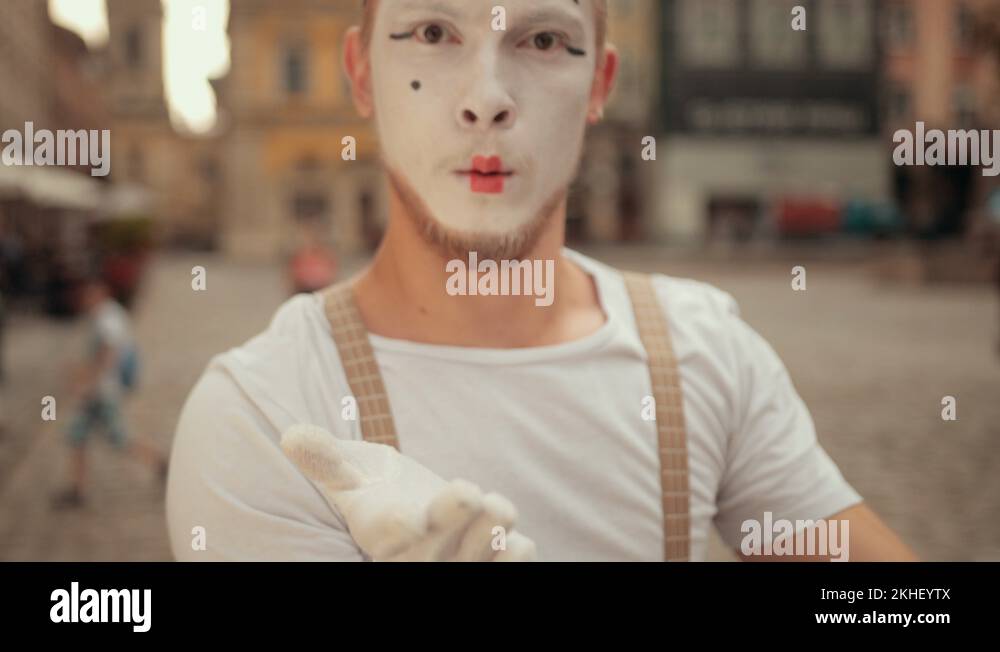 Mime's expressions change from angry ready to fight, to smiling ...