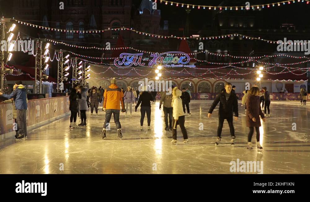 People skate on rink on the main square of Russia. Red Square in Moscow ...