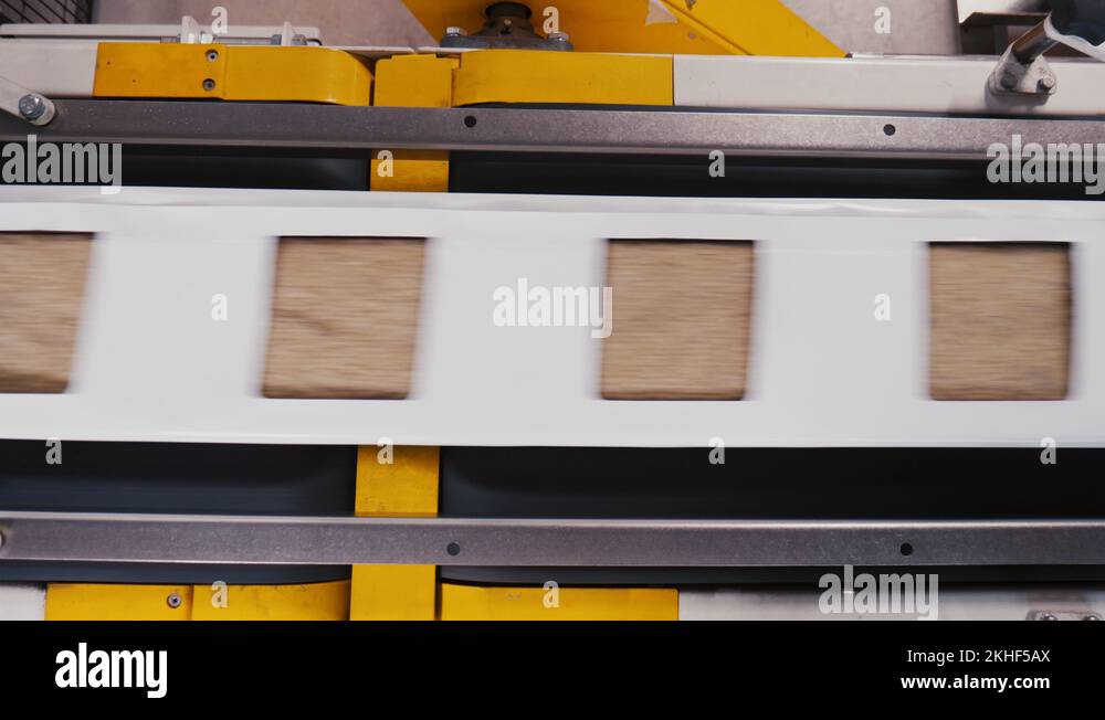 packaged mineral wool thermal insulation bars on conveyor Stock Video ...
