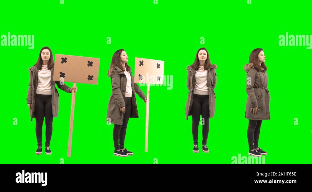 GREEN SCREEN Caucasian female posing as a strike participant, crowd ...