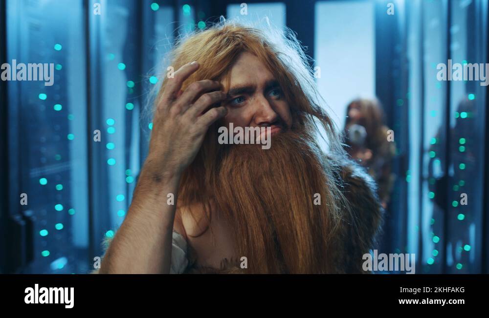 Dangerous caveman leader of hunter-gatherers tribe looking fiercely at ...