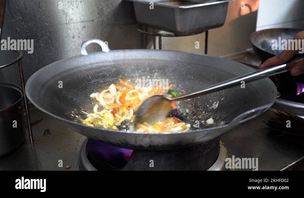 Asian wok stir fry Stock Videos & Footage - HD and 4K Video Clips - Alamy