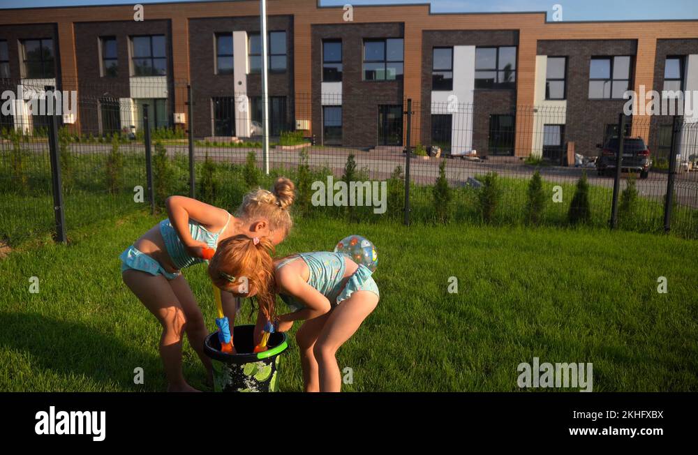 Naughty Girls Best Friends Water Fight With Toy Guns Sisters In