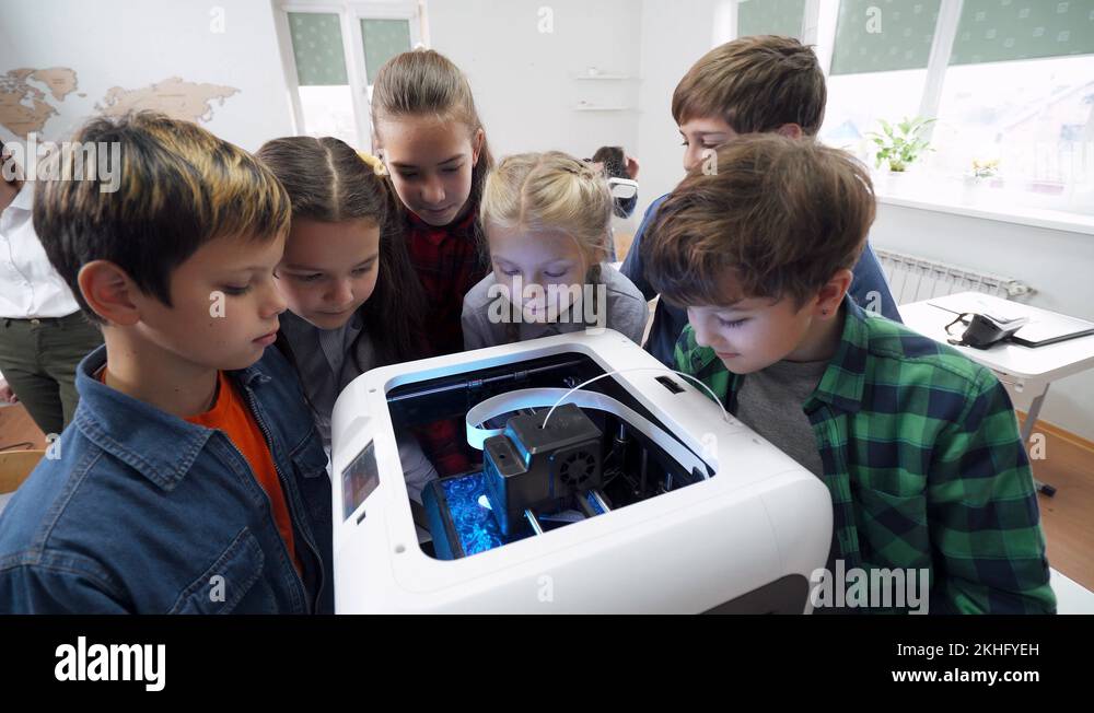 Education in the modern school, children learn modeling, boys and girls ...