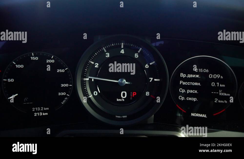 Dashboard speedometer and tachometer of a sports car. Includes ignition ...