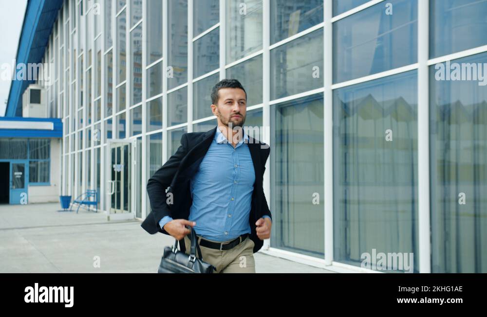 Man running along building Stock Videos & Footage - HD and 4K Video ...