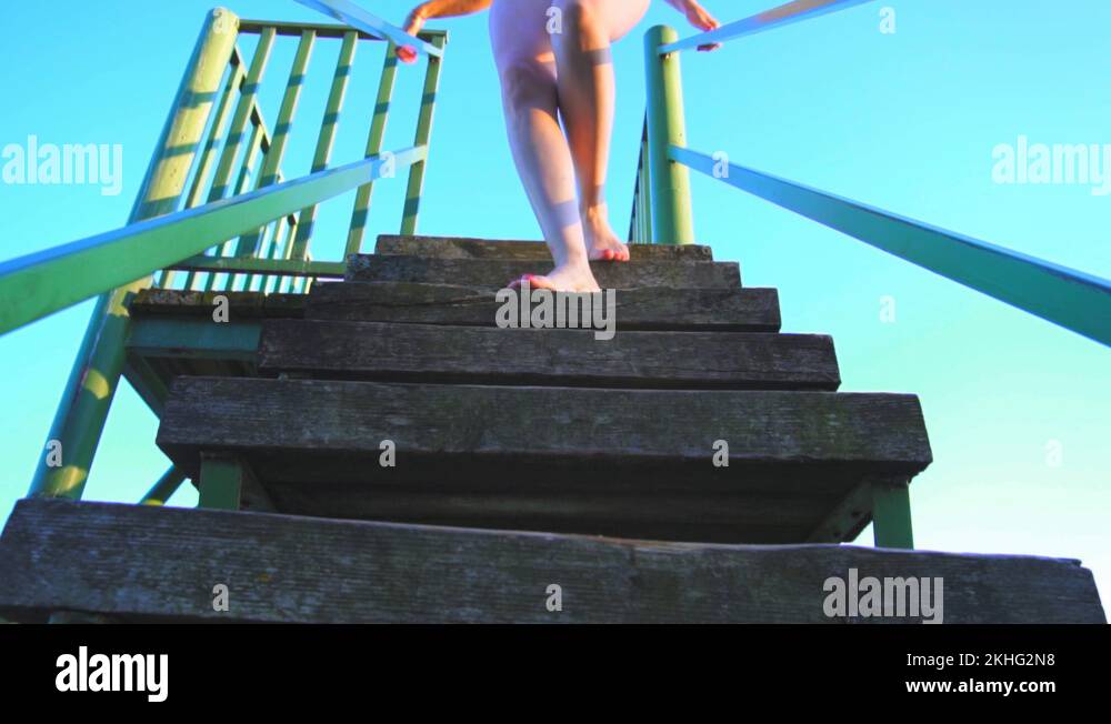 Girl stairs barefoot Stock Videos & Footage - HD and 4K Video Clips - Alamy