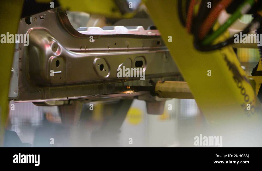 Automated robots at work inside an automobile manufacturing plant Stock ...
