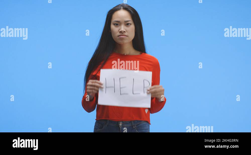 Woman with help sign Stock Videos & Footage - HD and 4K Video Clips - Alamy