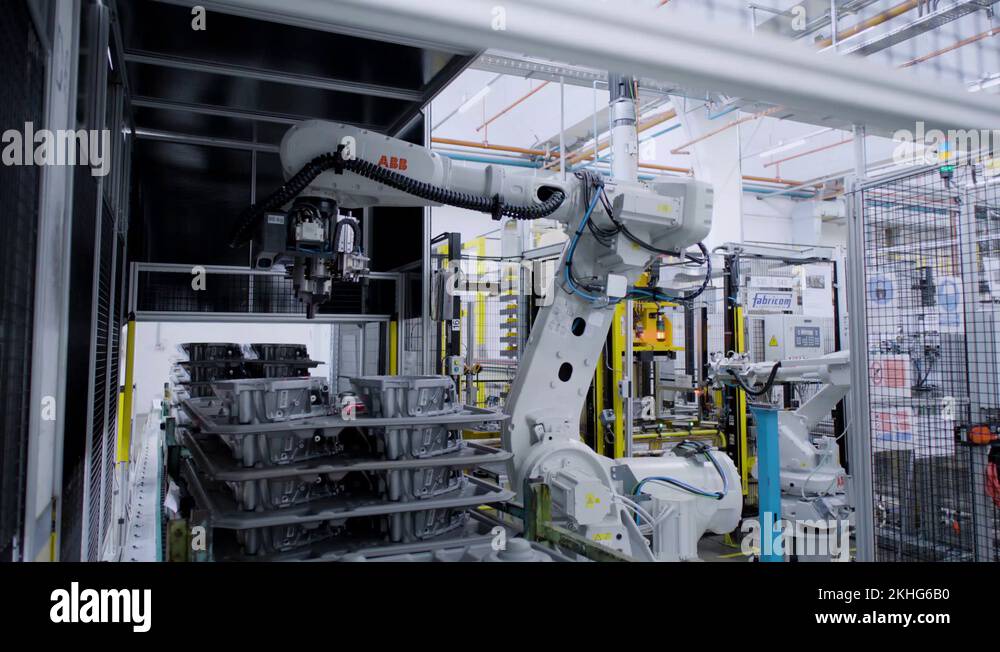 Automated robots at work inside an automobile manufacturing plant Stock ...