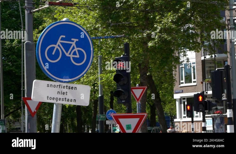 European pedestrian crosswalk sign. Traffic light with red color. Cross ...